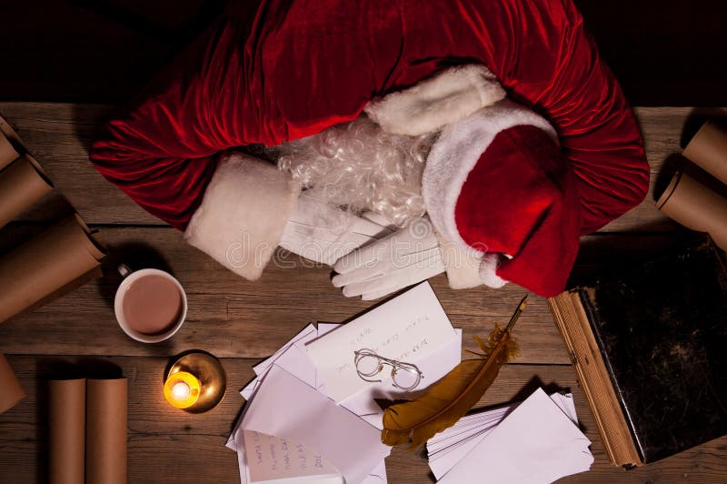 Santa Claus Sits at the Table and Sleeps after Hard Day Stock Image ...