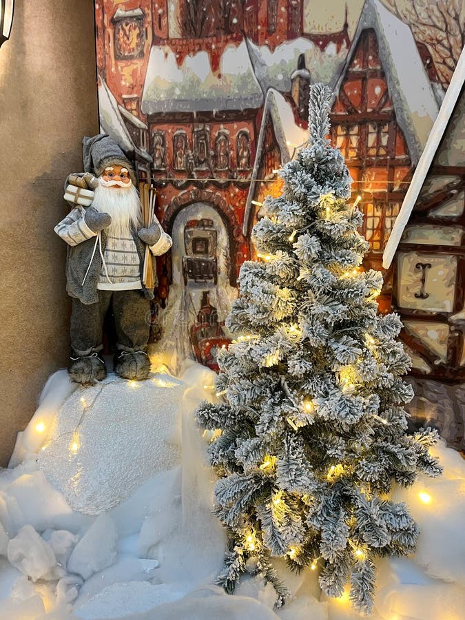 Santa Claus is Standing at the Christmas Tree Under the Lantern ...