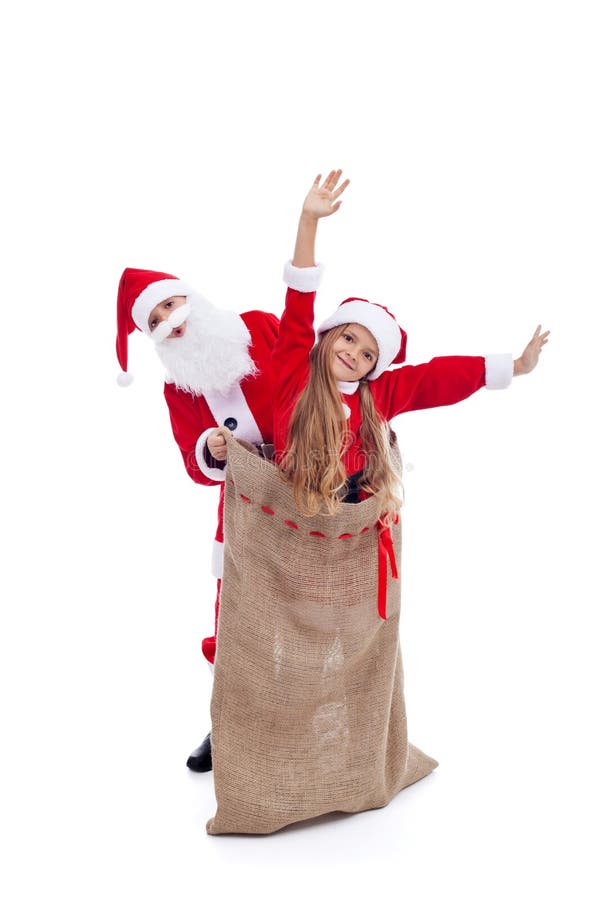 Santa Claus Surprised by Helper Popping Out of the Bag Stock Image ...