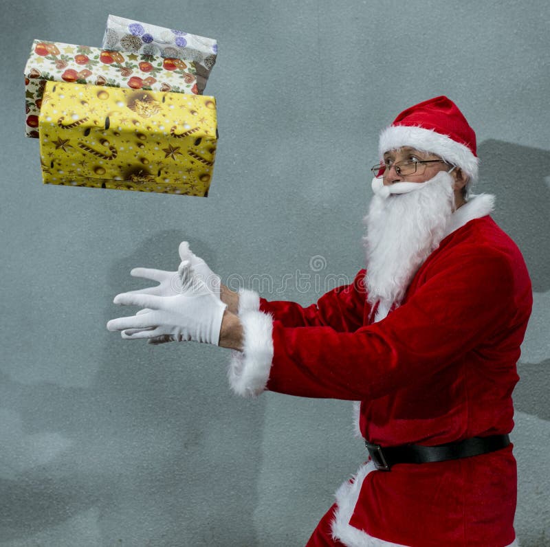 Santa Claus Throws Up Gifts with His Hands. Isolate Stock Image - Image ...