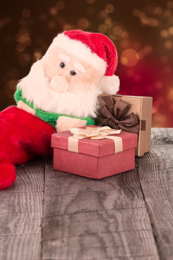 Santa Claus Toy and the Gift Boxes Stock Image - Image of grain, give ...