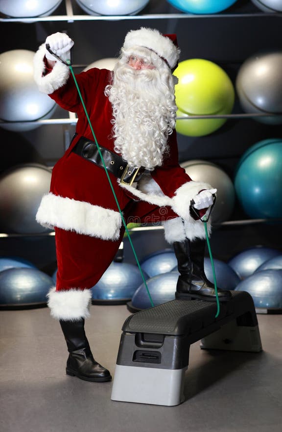 Santa Claus Training before Christmas Stock Photo - Image of lifting ...