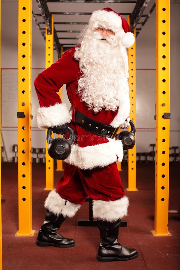 Santa Claus Training before Christmas in Gym - Kettlebells Stock Image ...