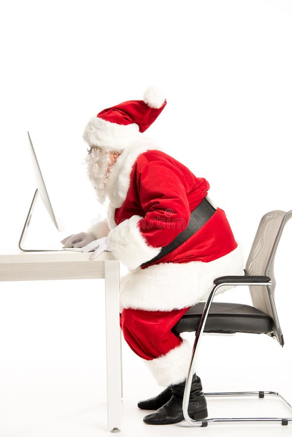 Santa Claus using computer stock photo. Image of festive - 84223604