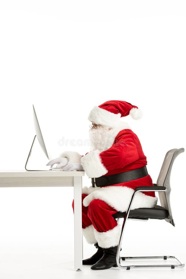 Santa Claus using computer stock image. Image of nicholas - 123119759