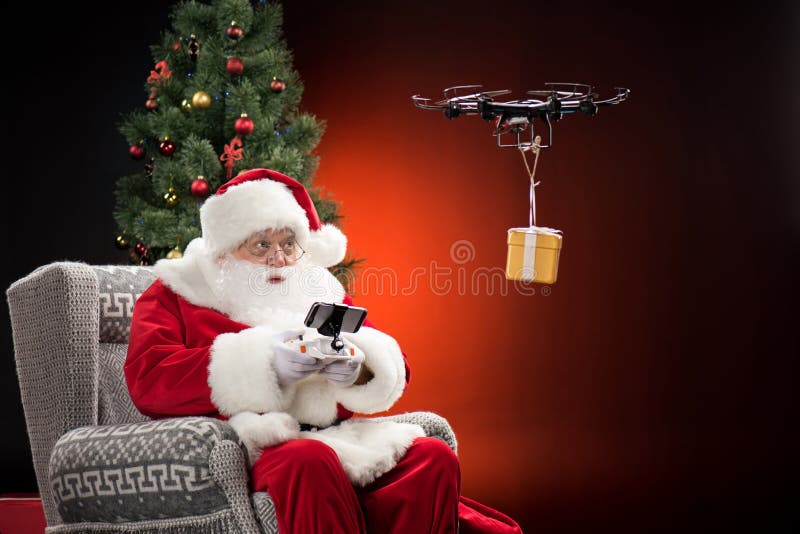Santa Claus using drone stock image. Image of merry, santa - 87870931