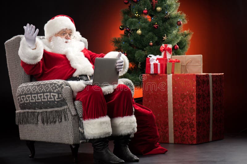 Santa Claus Using Laptop and Gesturing Stock Image - Image of ...