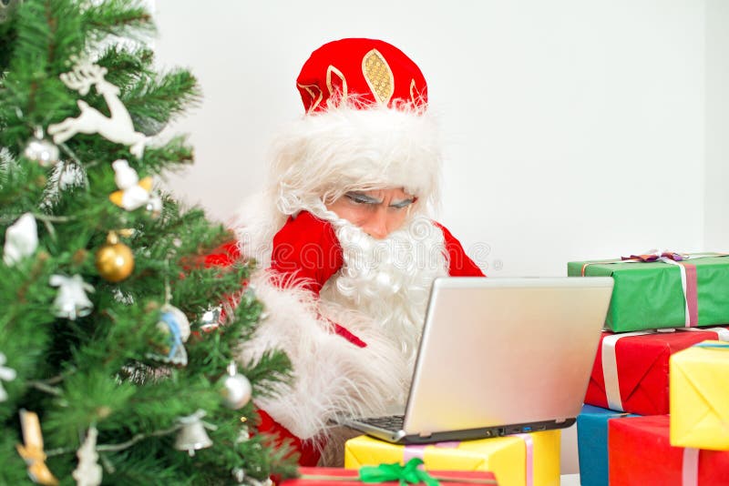 Santa Claus is Using Laptop. Stock Image - Image of traditional, santa ...