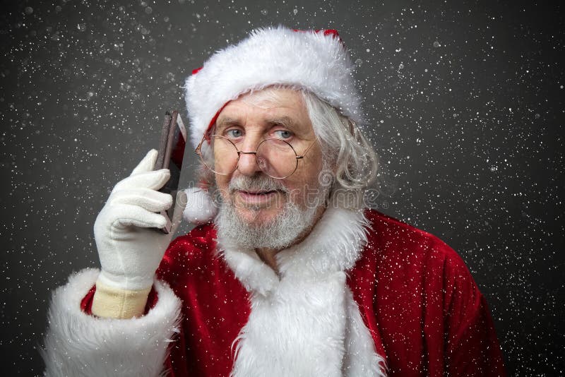 Santa Claus Using Smartphone - Calling Phone or Texting a Message Stock ...