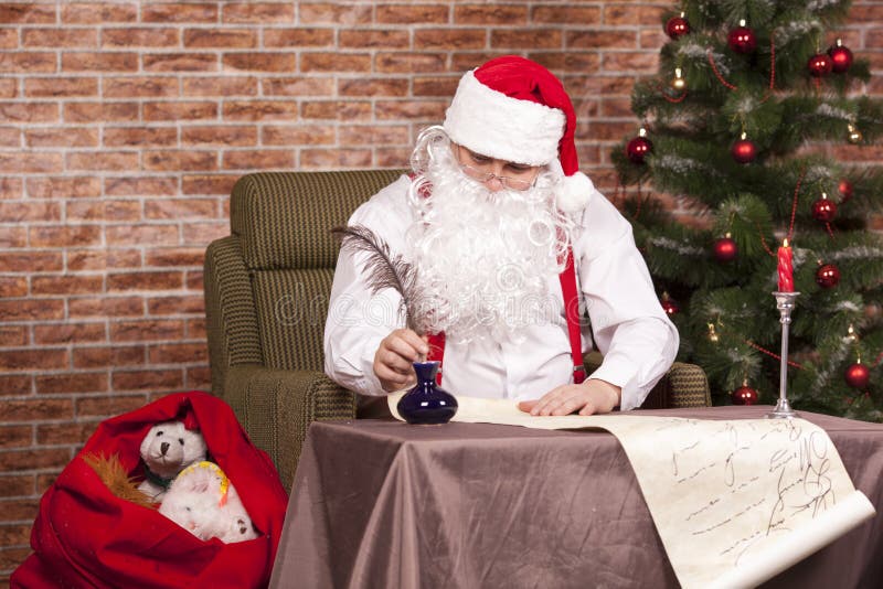 Santa Claus Checks His List Stock Image - Image of glove, holiday: 31371243