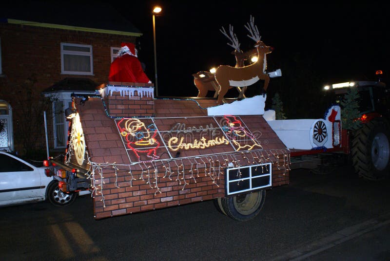Santa Clause Float at Night Stock Photo - Image of electrical ...