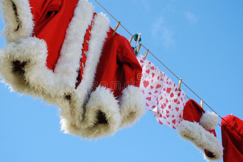 Santa clothes line stock image. Image of pompon, background - 3667745