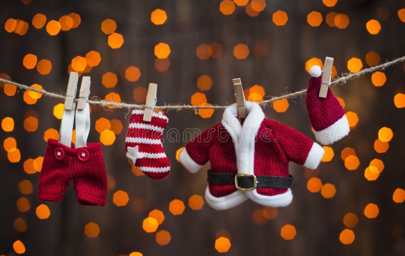 Santa Clothing on a Clothesline Background of Lights Stock Image ...