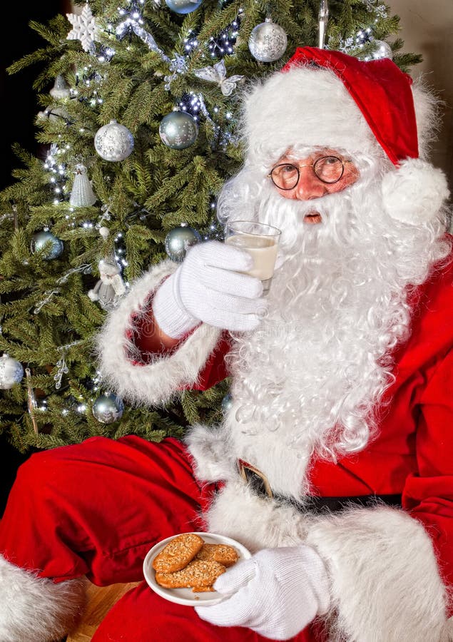 Santa with Cookies and Milk Stock Image - Image of smiling, xmas: 21487591
