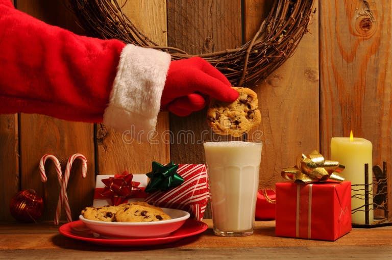 Santa Dunking Cookie stock image. Image of christmas - 21883419