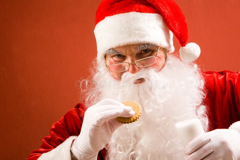Santa eating stock photo. Image of event, mature, december - 12085088