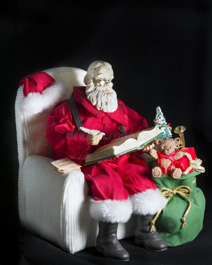 Santa Figurine, Sitting and Writing Stock Image - Image of december ...