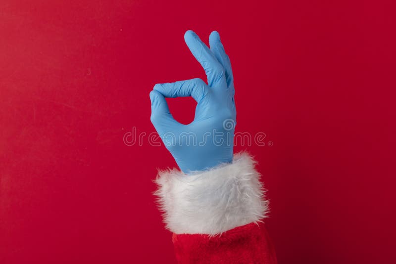 Santa Hands Wearing Blue PPE Protective Gloves Making OK Hand Gesture ...