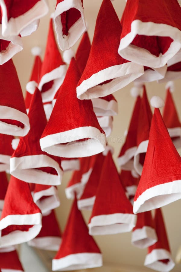 Santa Hats Hanging from Ceiling Stock Photo - Image of tradition ...