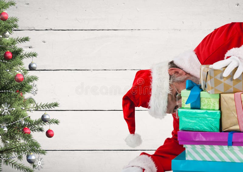 Santa Claus Hiding Behind Christmas Gift Boxes Stock Photo - Image of ...