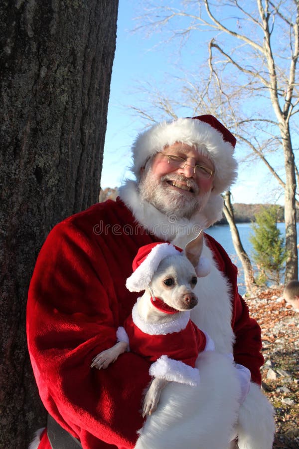 Santa with His Dog stock image. Image of greetings, costume - 22082769