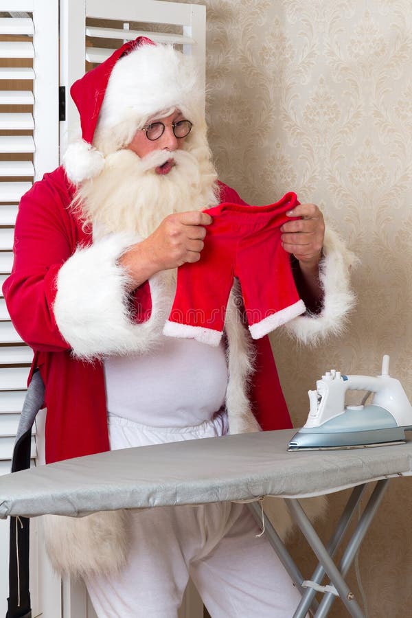 Santa with a Laundry Problem Stock Image - Image of laundry, costume ...