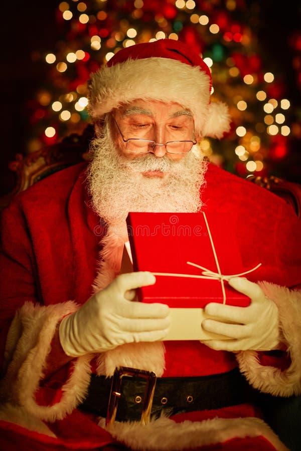 Santa Opening Magic Present Stock Image - Image of magic, open: 256587191