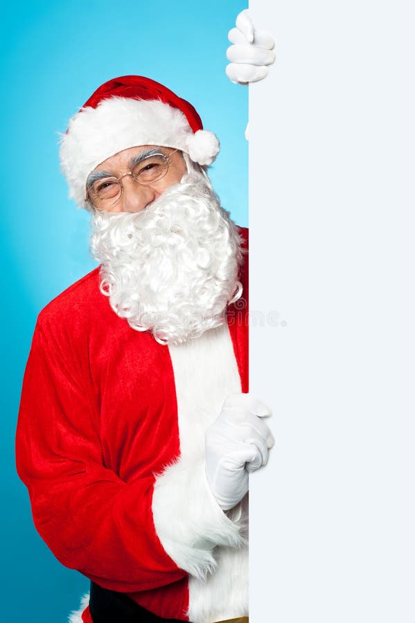 Santa Posing beside Long Blank Banner Ad Stock Image - Image of merry ...