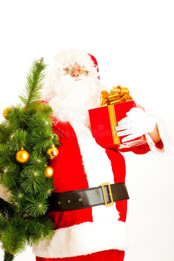 Santa with Present and Christmas Tree Stock Photo - Image of gift ...