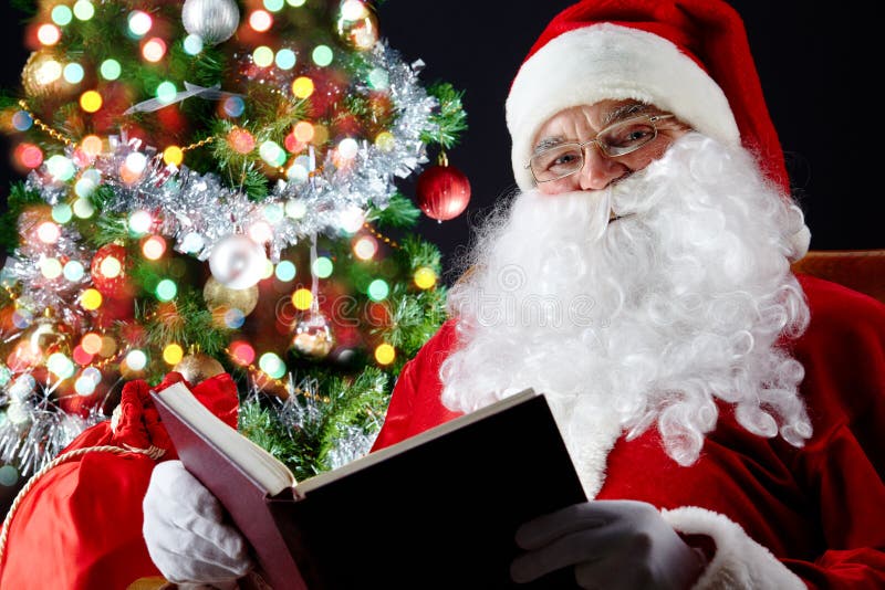 Santa reading a book stock image. Image of sack, noel - 16328671