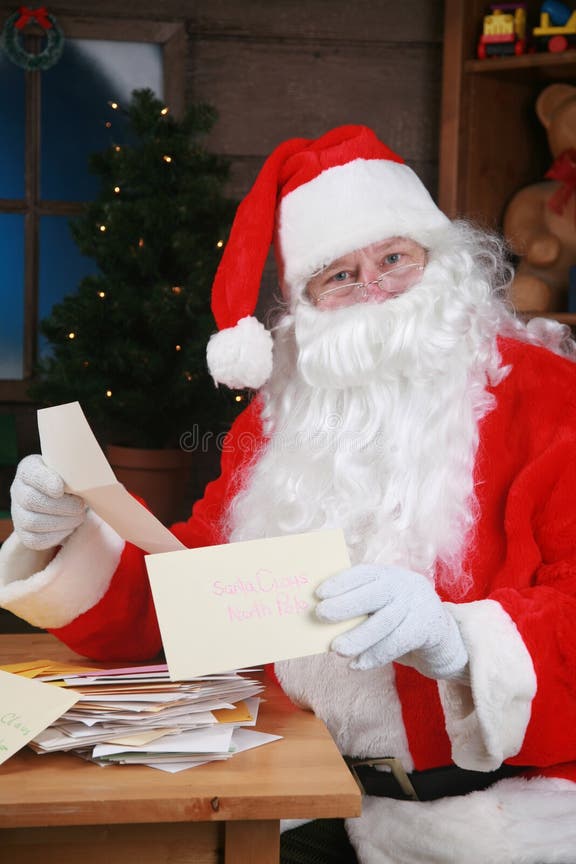 Santa reads his mail stock photo. Image of hammer, happy - 10913990