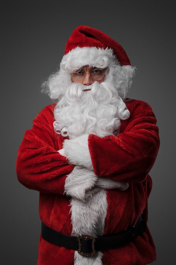 Santa with Red Costume Posing Against Gray Background Stock Photo ...