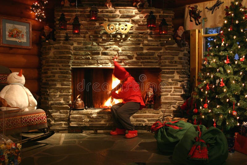 Santa s helper making fire stock image. Image of office - 1615585