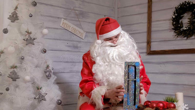 Santa Shows Trick with a Pipe Stock Photo - Image of face, looking ...