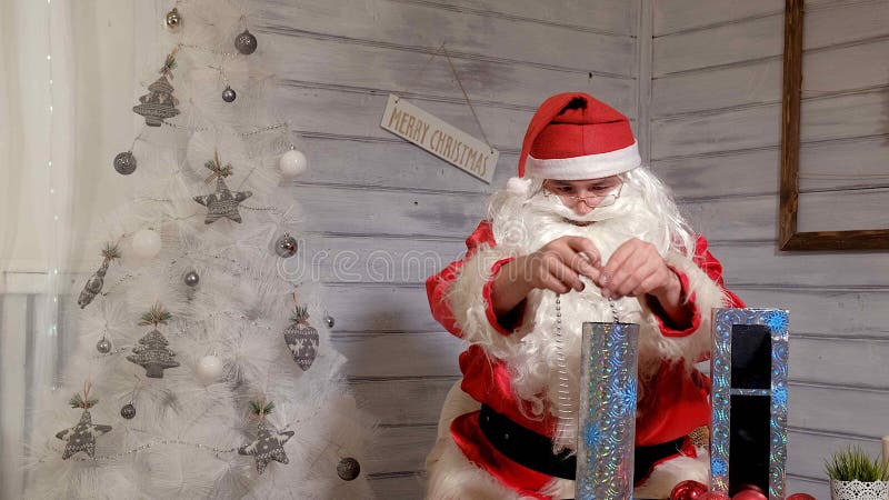 Santa Shows Trick with a Pipe Stock Photo - Image of magic, gift: 109379958