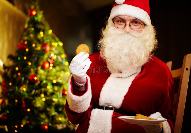 Santa sweet tooth stock image. Image of older, food, elderly - 24515239