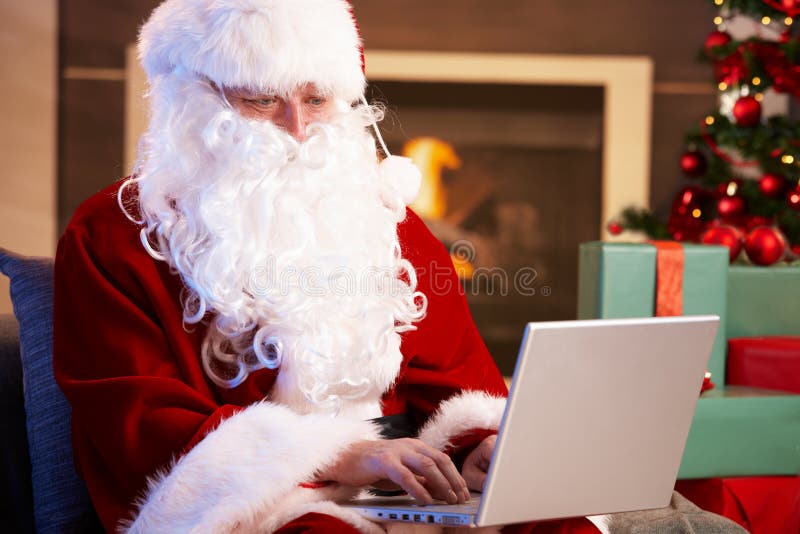 Mysterious Male Santa Hacker Holding Laptop Computer Stock Photo ...
