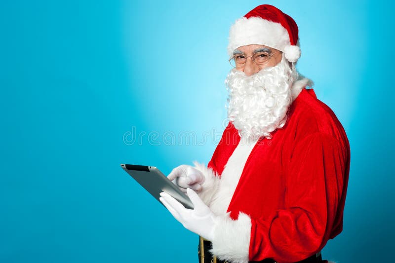 Santa Using Newly Launched Electronic Tablet Stock Image - Image of ...