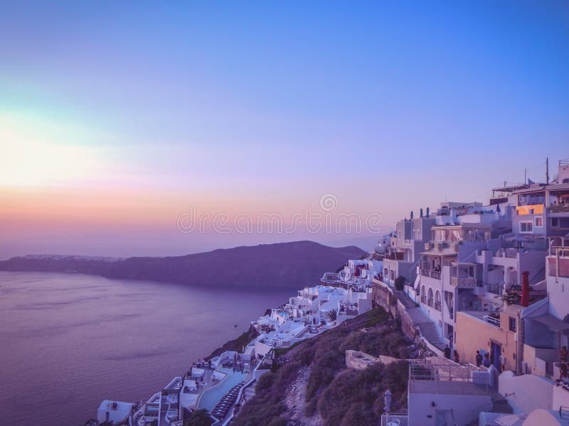 Santorini at Dusk with Cliffside Buildings and Sea View Stock ...