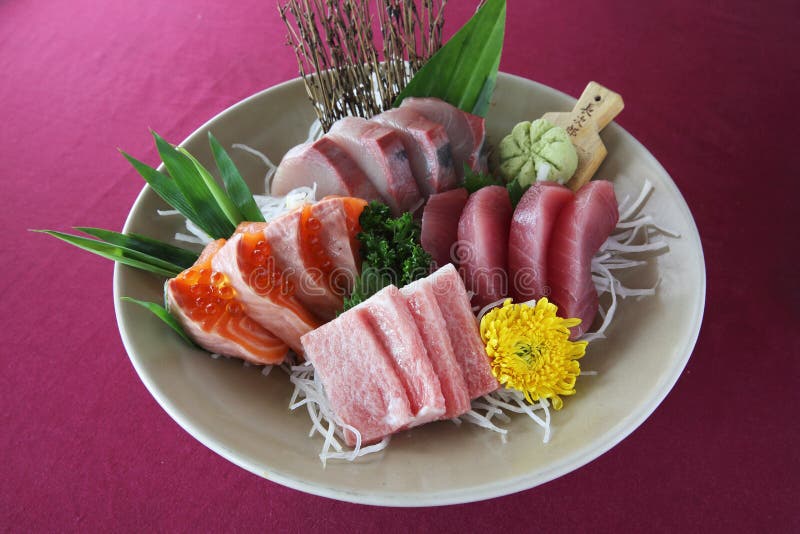 Sashimi set on a plate stock photo. Image of nature - 136961576
