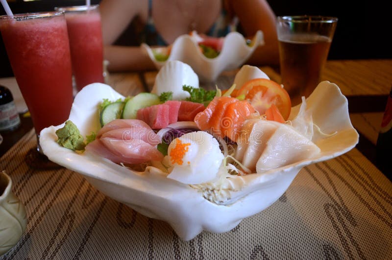 Sashimi on ice with water stock photo. Image of splashing - 7298882