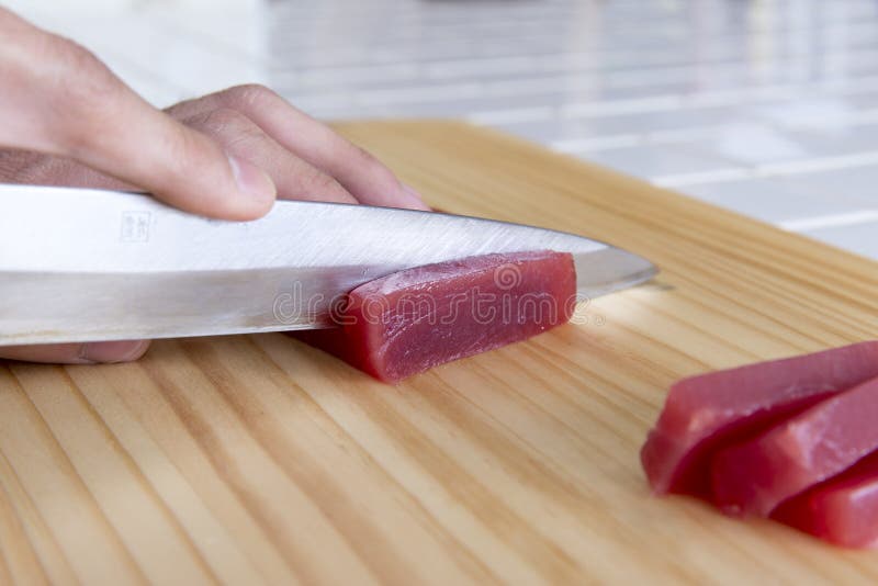 Sashimi, tuna, cut stock photo. Image of board, person - 170054452