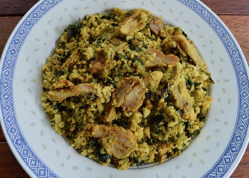 Satay Chicken with Spinach and Rice Stock Photo - Image of cream, milk ...