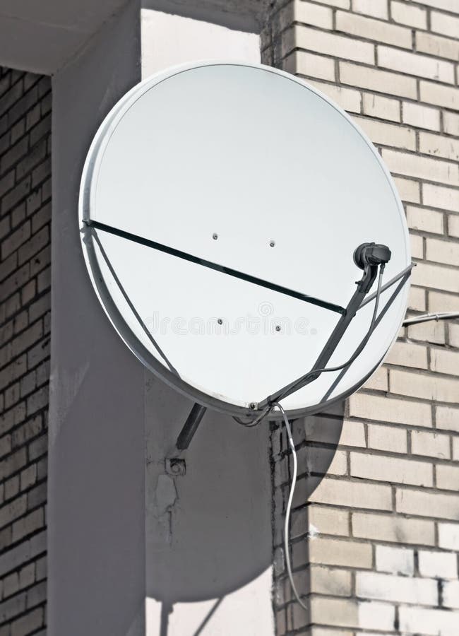 Satellite Antenna on Wall of Brick Building Stock Photo - Image of ...