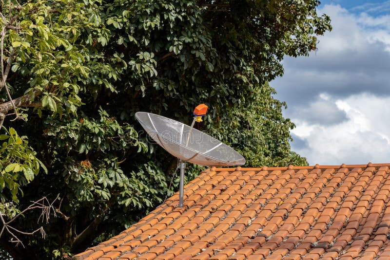 Satellite dish on roof stock image. Image of signal - 218809447