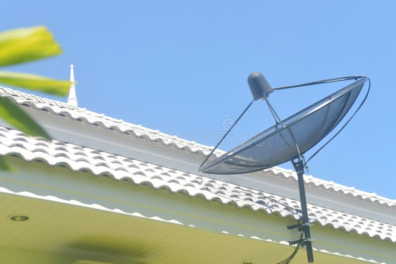 Satellite dish on the roof stock image. Image of antenna - 62943879