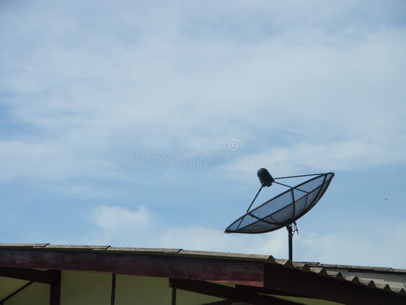 A Satellite Dish on the Roof Stock Photo - Image of broadcast, building ...