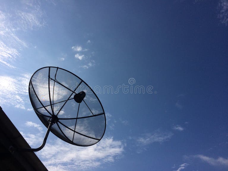 Satellite disk on roof stock photo. Image of roof, home - 102317858