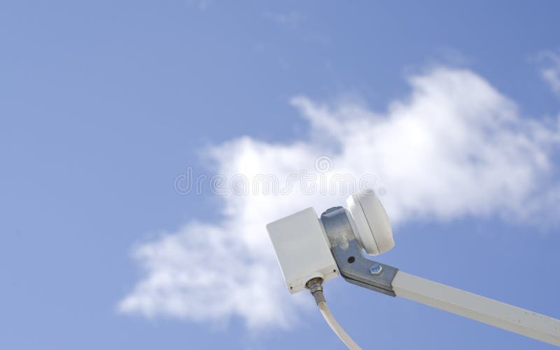 Satellite LNB against sky stock image. Image of band - 24273135