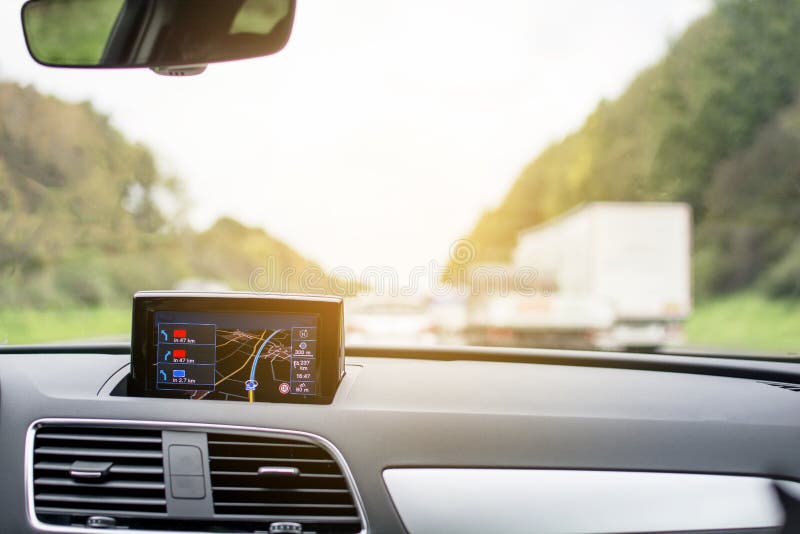 Satellite Navigation System Device in Car with Blurred Transportation ...